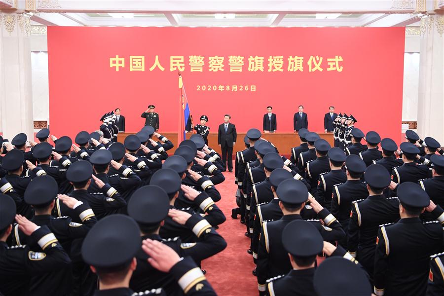 Xi confers flag on China's police force